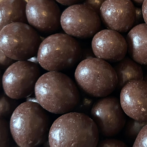 Noix de macadam enrobées de chocolat noir 60% – Bonbons Arômes